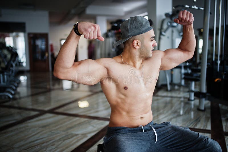 Fit and Muscular Arabian Man Posing in Gym. Stock Photo - Image of ...