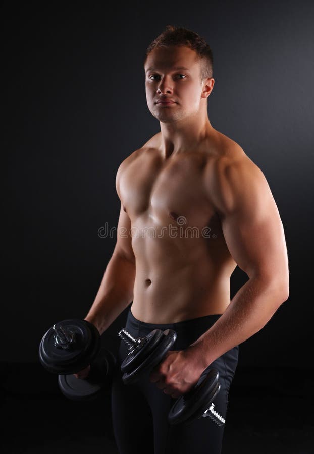 Fit Muscular Man Exercising with Dumbbell Stock Photo - Image of active ...
