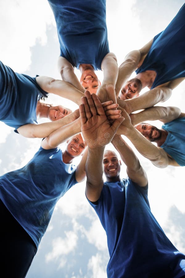 Fit People with Hands Stacked Stock Photo - Image of smiling, power ...