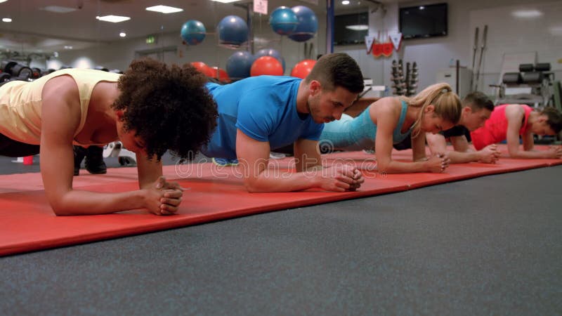 Fit People in Plank Position in Gym Stock Video - Video of class ...