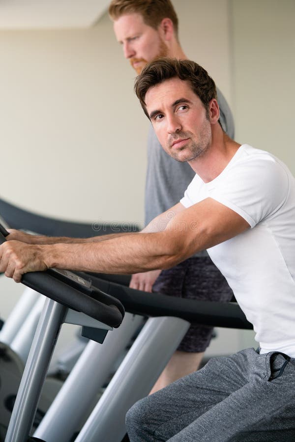 Fit People Working Out at the Gym Stock Image - Image of exercising ...