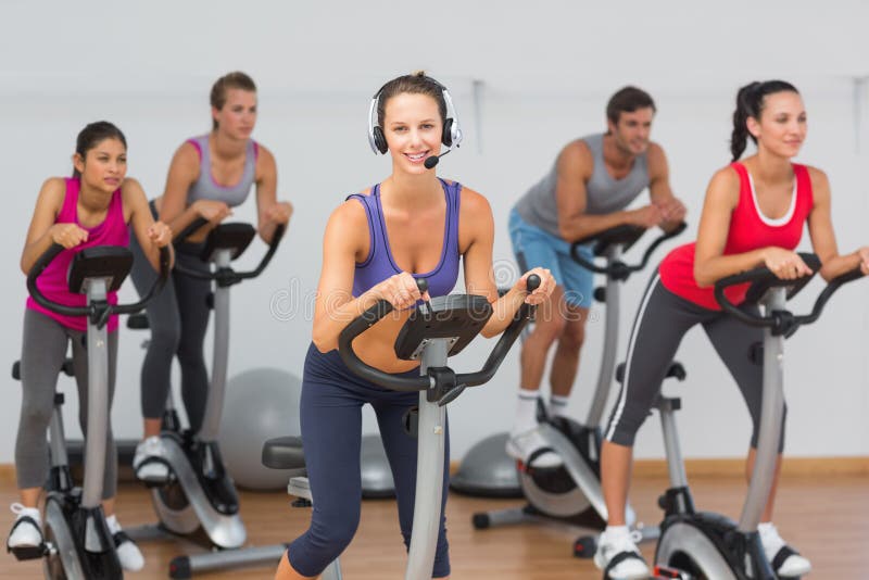 Fit People Working Out at Spinning Class Stock Image - Image of adult ...