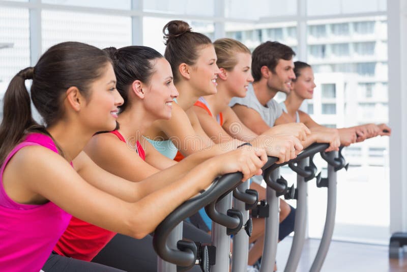 Fit People Working Out at Spinning Class Stock Image - Image of ...