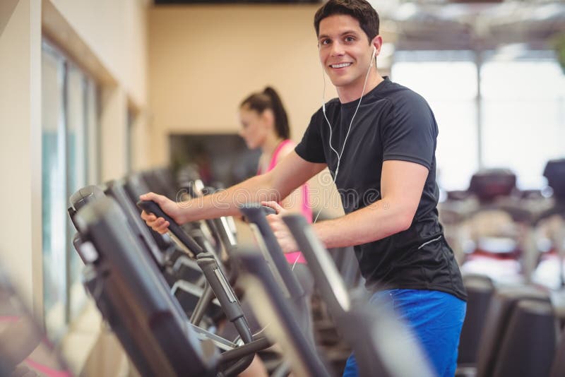 Fit People Working Out Using Machines Stock Image - Image of fitness ...