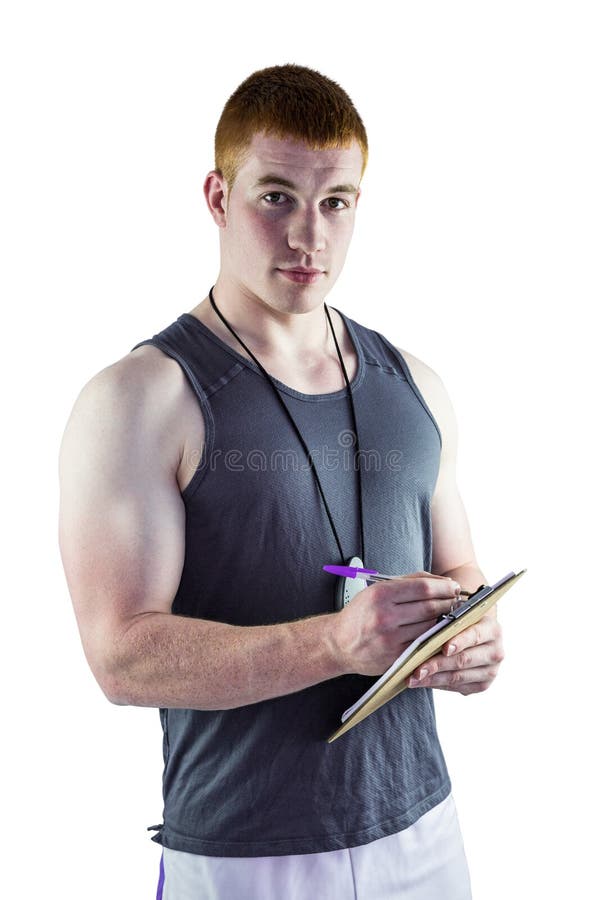 Fit Personal Trainer Writing on Clipboard Stock Photo - Image of ...