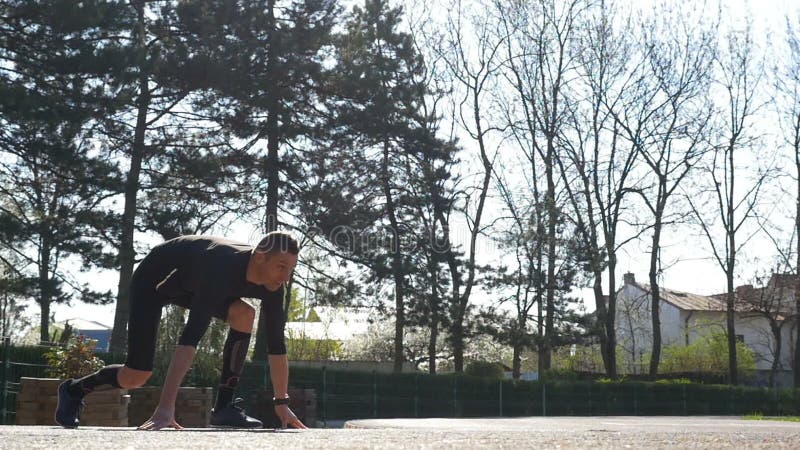 Runner on the Starting Blocks in Position Stock Footage - Video of ...