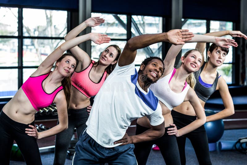 Fit Smiling Group Doing Exercise Stock Image - Image of people ...