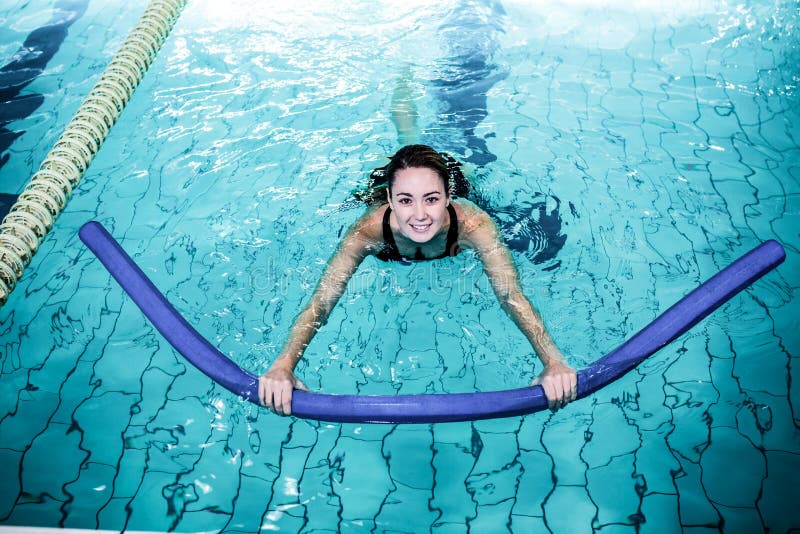 Fit Smiling Woman Swimming with a Foam Roller Stock Image - Image of ...