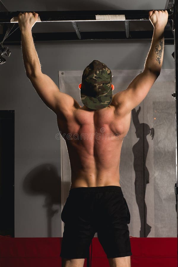 Fit Toes To Bar Man Pull-ups Bars Workout Exercise at Gym Stock Photo ...