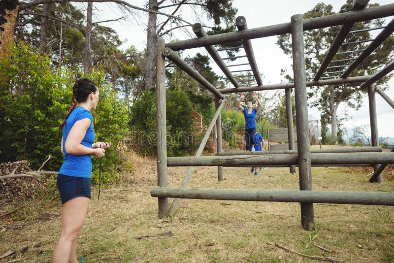 Fit Woman Climbing Monkey Bars Stock Image - Image of hanging, climb ...