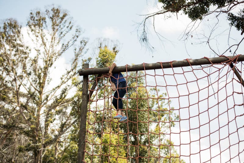 Fit Woman Climbing a Net during Obstacle Course Stock Image - Image of ...