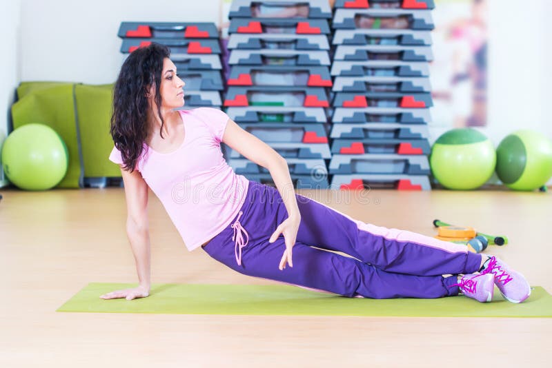 Fit Woman Doing Plank Core Exercise Training Back and Press Muscles ...