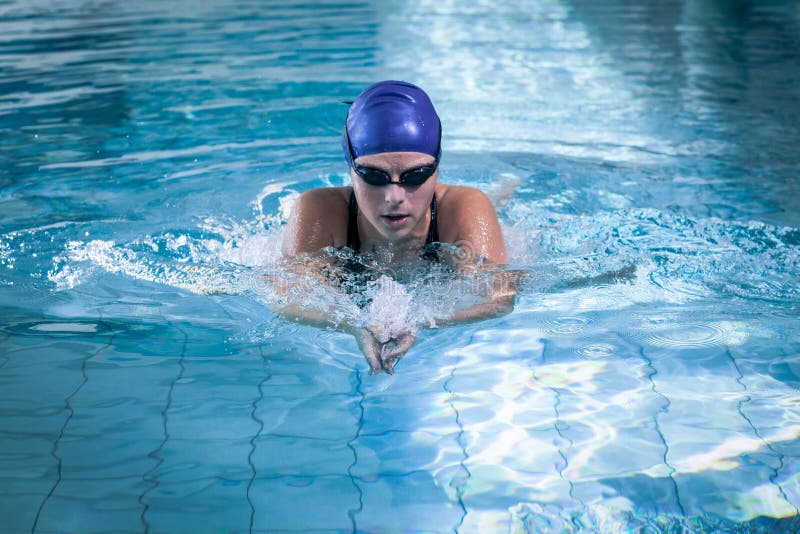 Fit woman swimming stock photo. Image of sport, center - 66173848