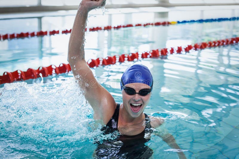 Fit Woman Triumphing with Raised Arm Stock Photo - Image of google ...