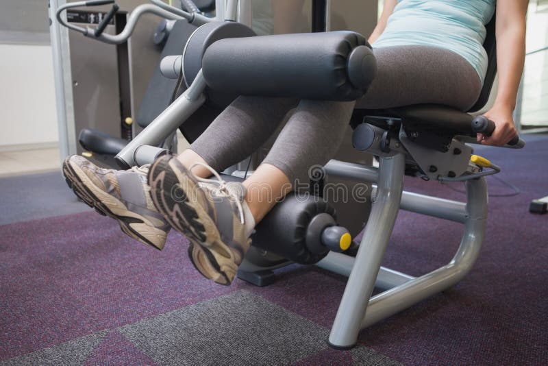 Fit Woman Using Weights Machine for Legs Stock Image - Image of ...
