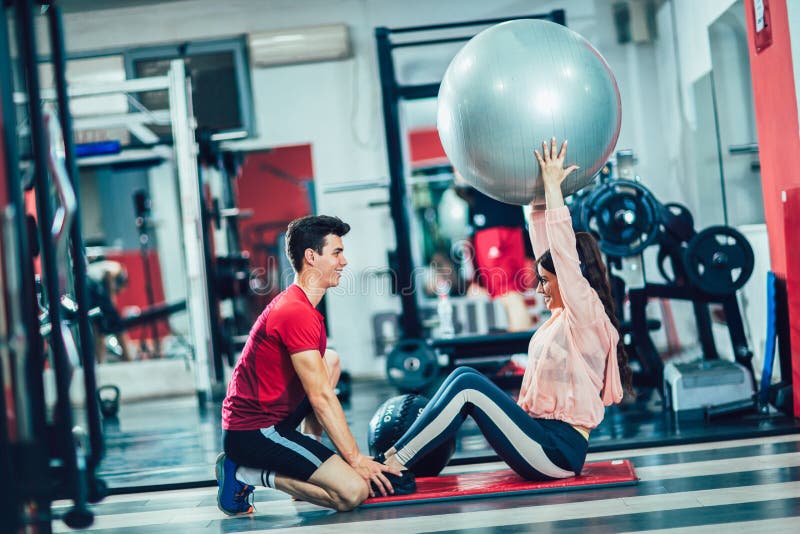 Woman Working Out with Trainer at the Gym Stock Photo - Image of adult ...