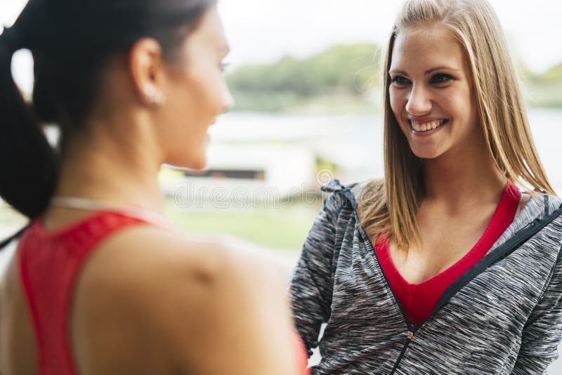 Fit women talking outdoors stock image. Image of caucasian - 61183139