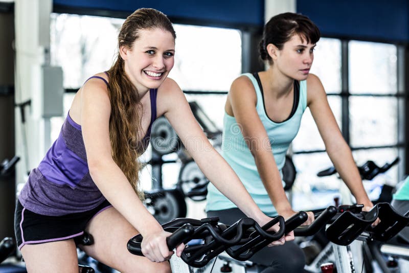 Fit Women Working Out at Spinning Class Stock Image - Image of happy ...
