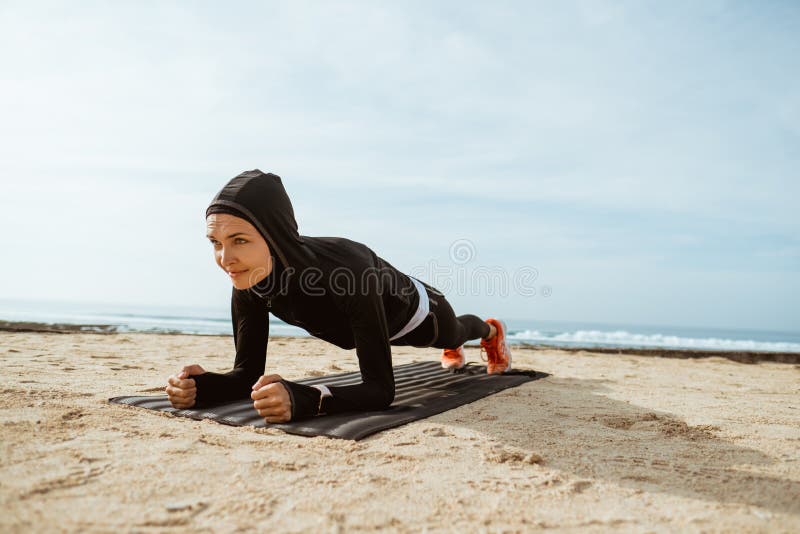 Fit young woman exercising stock image. Image of core - 172362655