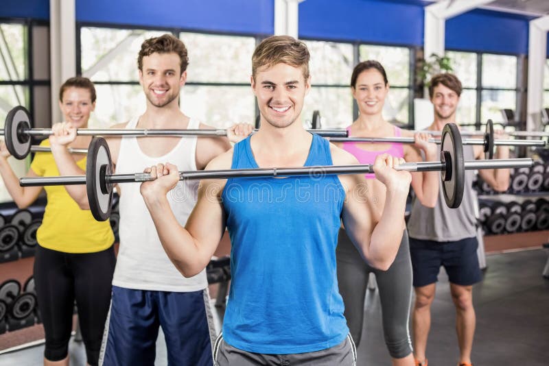 Fitness Class Lifting Barbell Stock Image - Image of health, care: 66970153