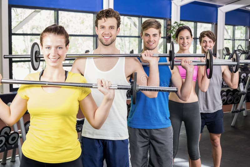 Fitness Class Lifting Barbell Stock Image - Image of female, leisure ...