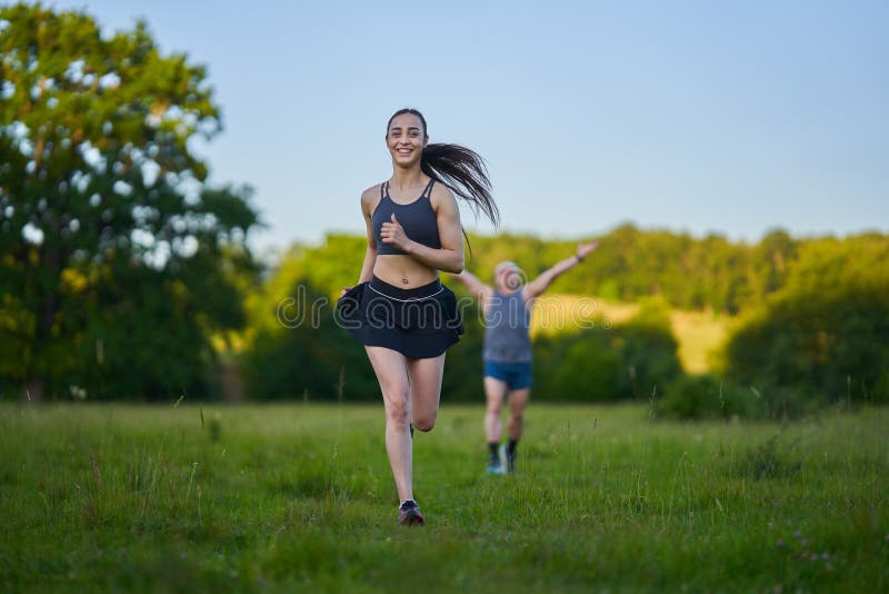Fitness Couple Jogging in the Forest Stock Image - Image of body, girl ...