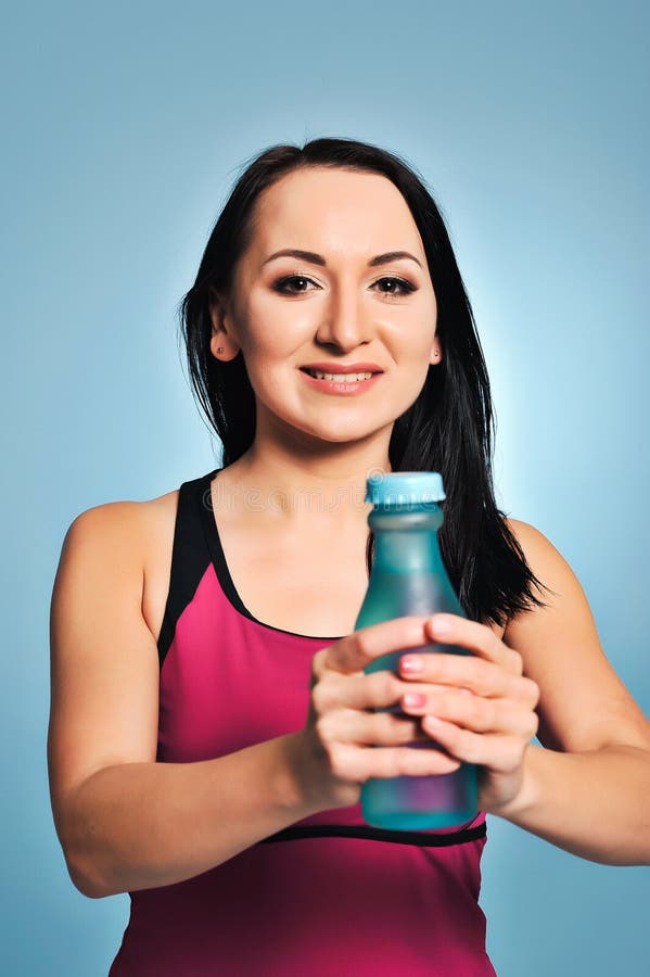 Cheerful Charming Fitness Girl Showing Bottle Water Stock Photos - Free ... Cheerful Charming Fitness Girl Showing Bottle Water Stock Photos - Free ...