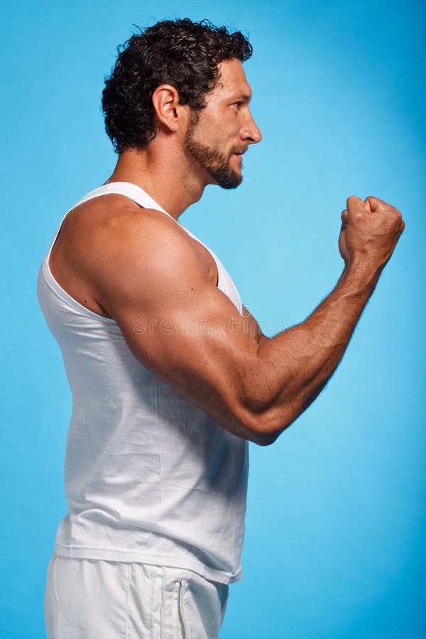 Biceps Curlover Blue Background Stock Photos - Free & Royalty-Free ...