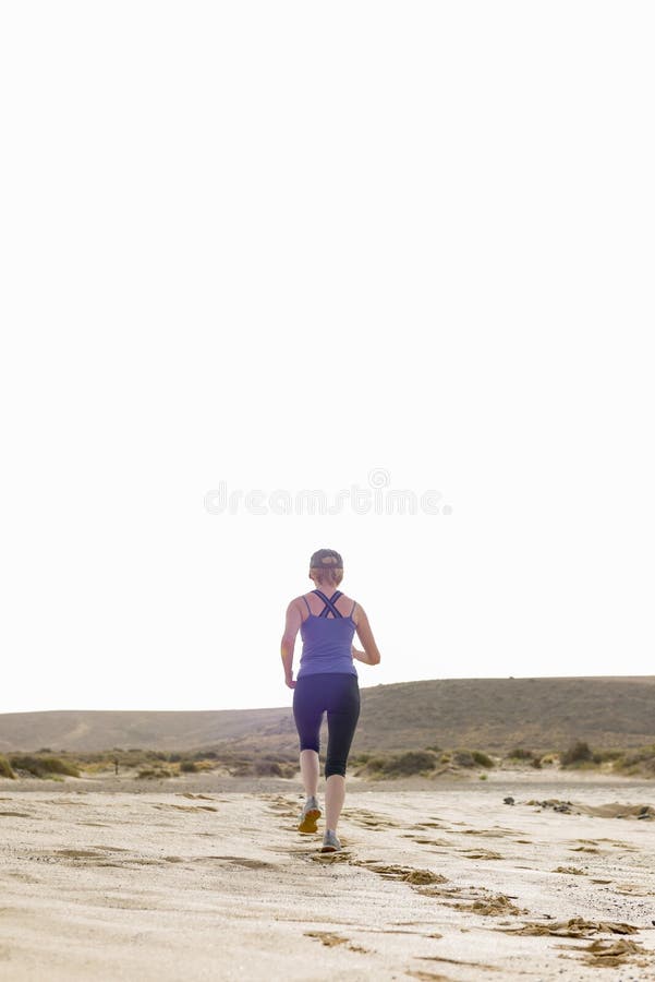 Fitness Lady in Desert Running into the Distance Stock Image - Image of ...