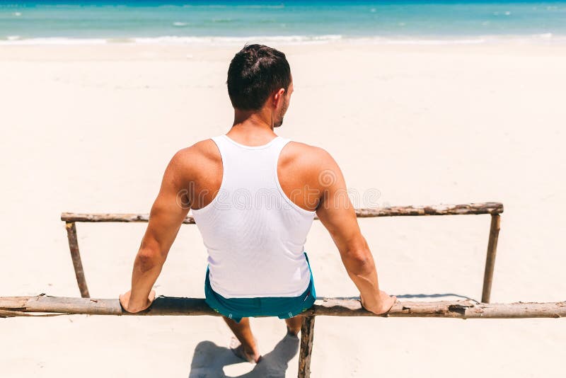 Fitness Man on the Beach Back View Stock Image - Image of adult, cross ...