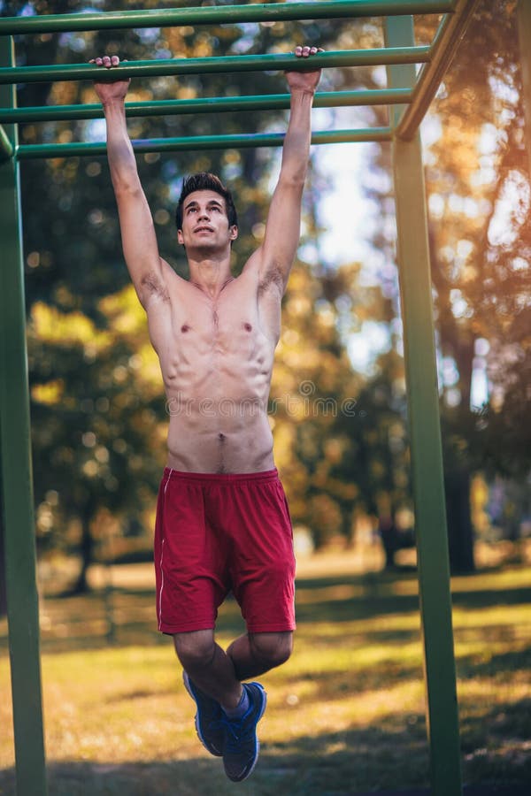 Fitness Man Doing Workouts Outdoors Stock Image - Image of effort ...