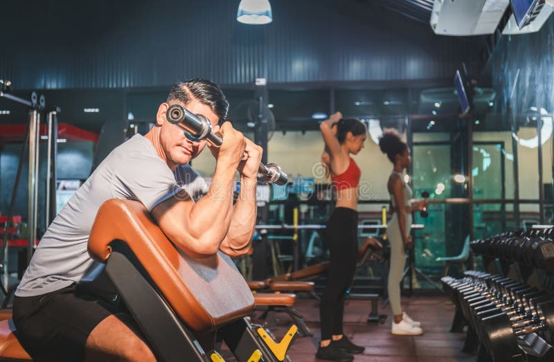 Fitness Man Lifting Weights in Gym Fitness, Handsome Man Doing Biceps ... Fitness Man Lifting Weights in Gym Fitness, Handsome Man Doing Biceps ...