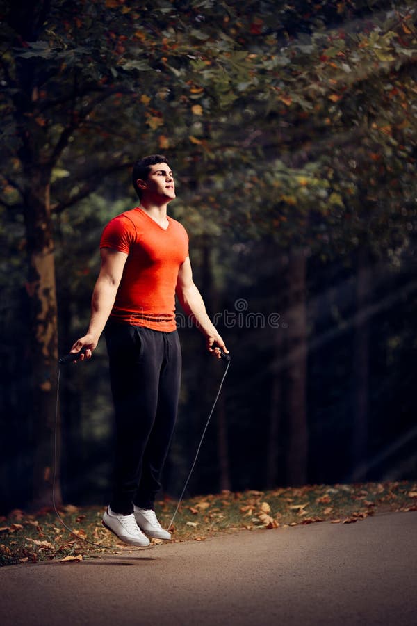 Fitness Man Skipping Rope Outdoors in Nature Stock Photo - Image of ...