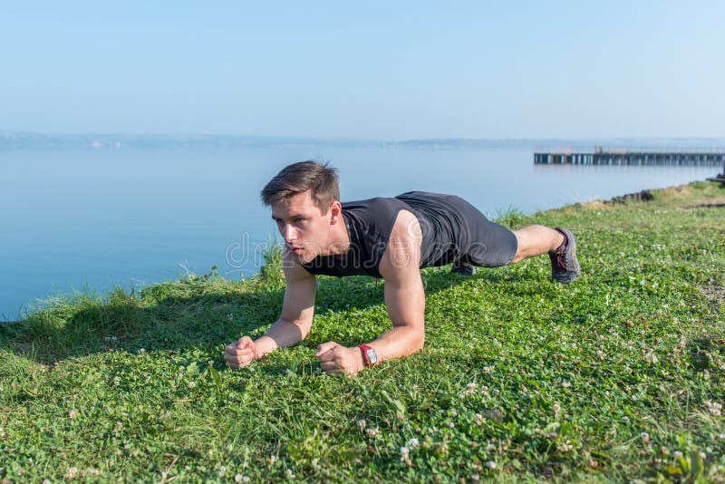 Fitness Man Working Out His Midsection Core Muscles Doing Plank ...