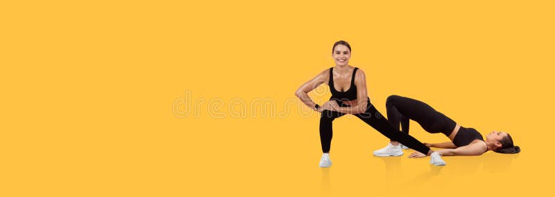Fitness Partners Engaging in Stretching Exercise in a Bright Studio ...