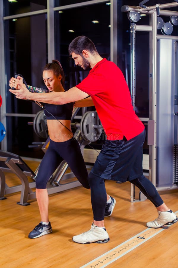 Fitness Sport Training And People Concept Personal Trainer Helping