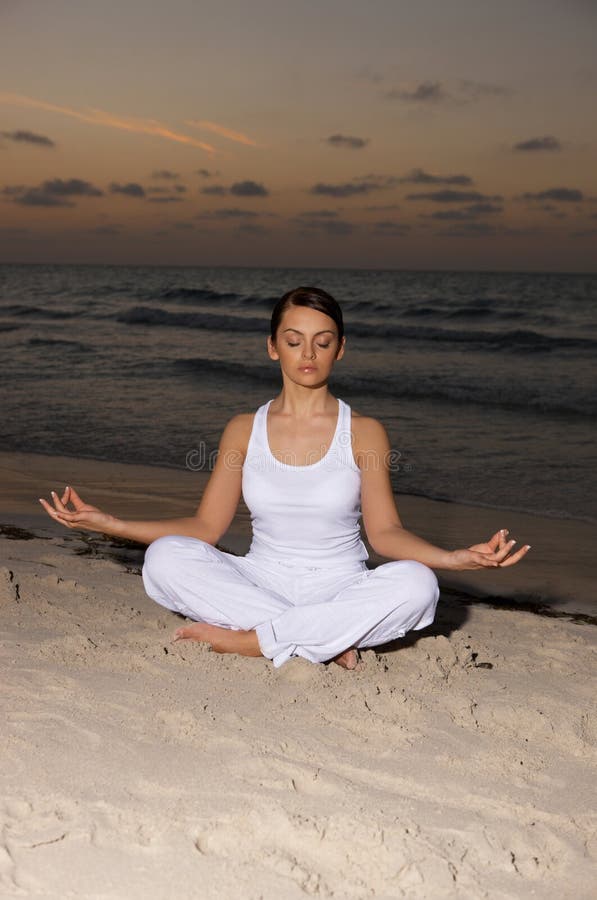 Yoga by sunset stock photo. Image of wellness, yoga, sunset - 8746196