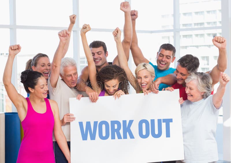Fitness Team Standing with Placard with Work Out Text in Gym Stock ...