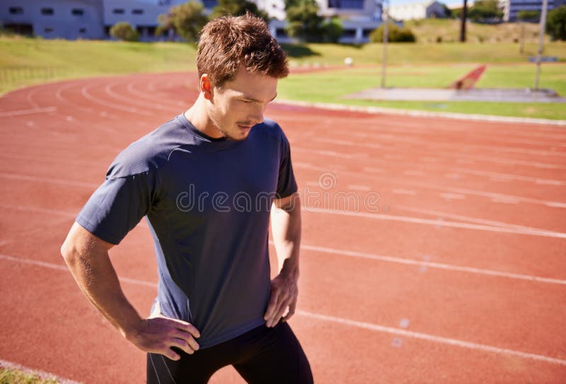 Fitness, Thinking and Man on Running Track for Competition Training ...