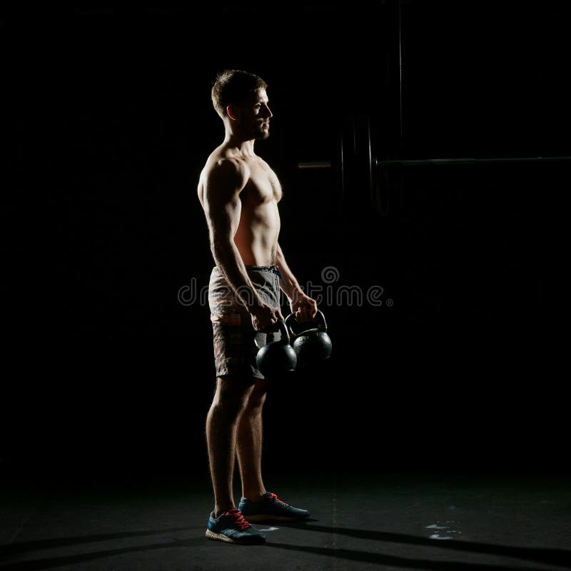 Fitness Training. Man Doing Exercises with Weights Stock Photo - Image ...