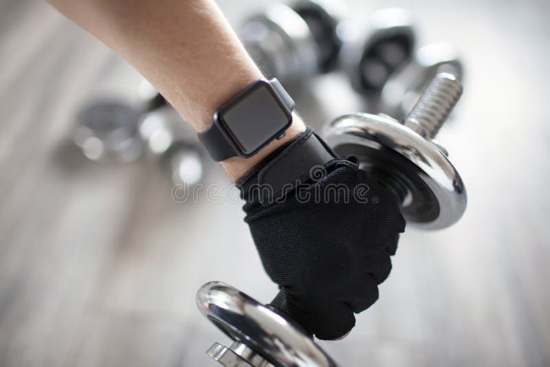 Fitness Smart Watch on Hand Stock Image - Image of heavy, dumbbell ...