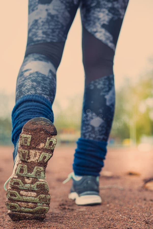 Fitness woman legs running stock photo. Image of forest - 82874928