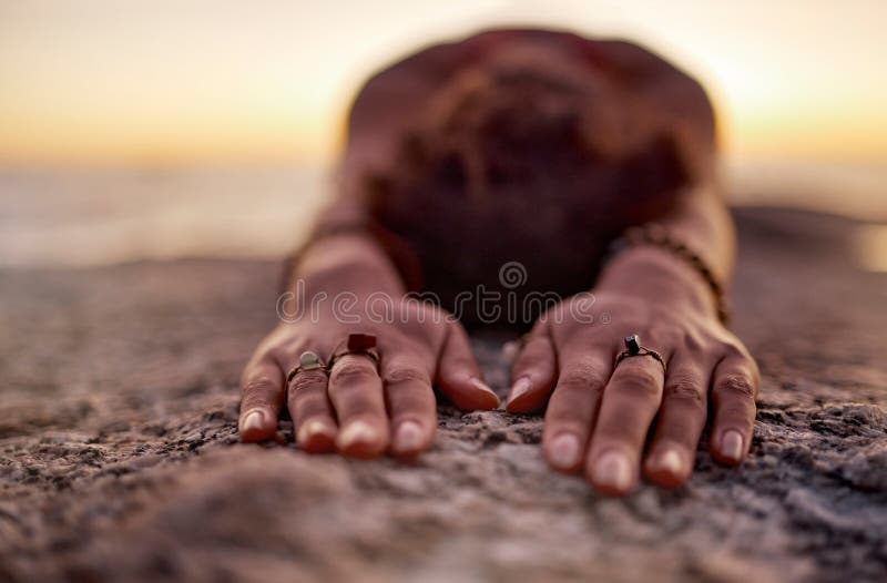Fitness Woman Meditation Or Yoga Hands On Sand Floor Stretching At The