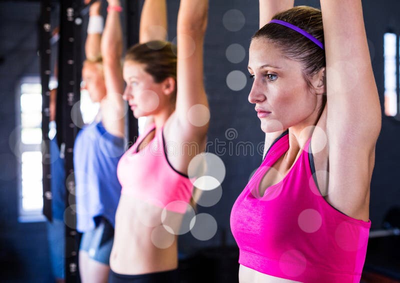 Fitness Women Doing Pull Ups with Bokeh in a Gym Stock Illustration ...