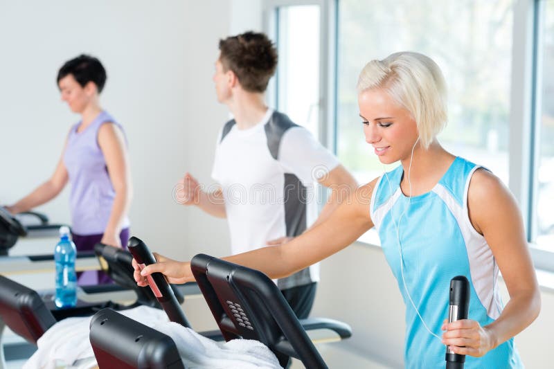 Fitness Young People on Treadmill Running Exercise Stock Photo - Image ...