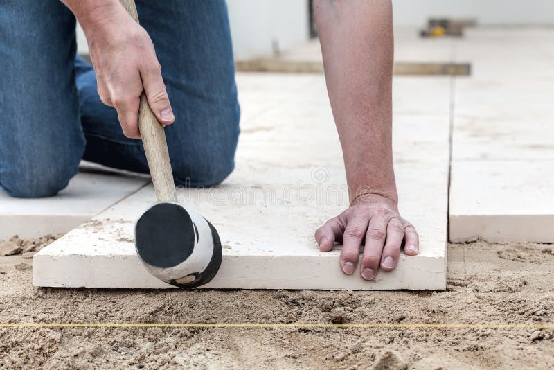 Fitting the concrete slab stock photo. Image of pavers - 36269860