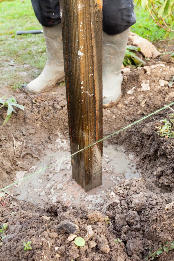 Fitting Fence Post stock photo. Image of worker, repairing - 37626552