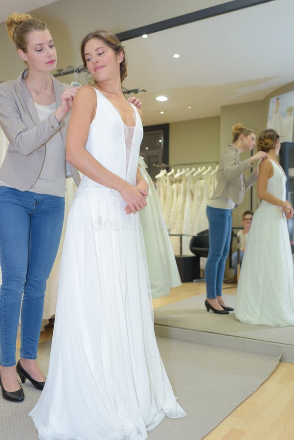 Fitting gown on client stock image. Image of shopping - 99253737