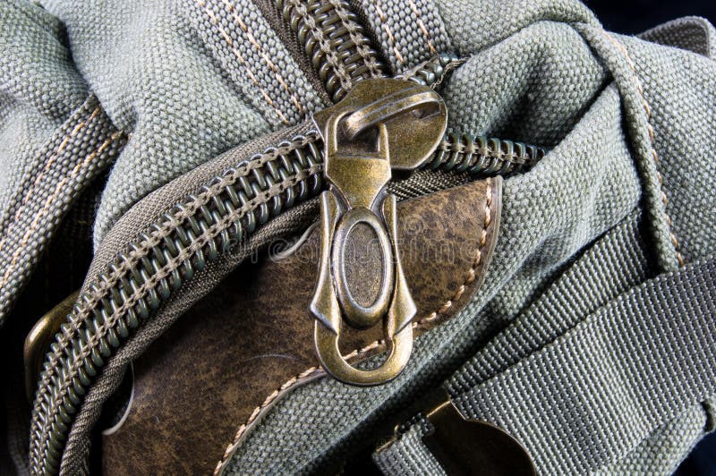 The Man`s Hand Zips Zip Up on the Jacket. Zipper Close Up in Hard Light ...
