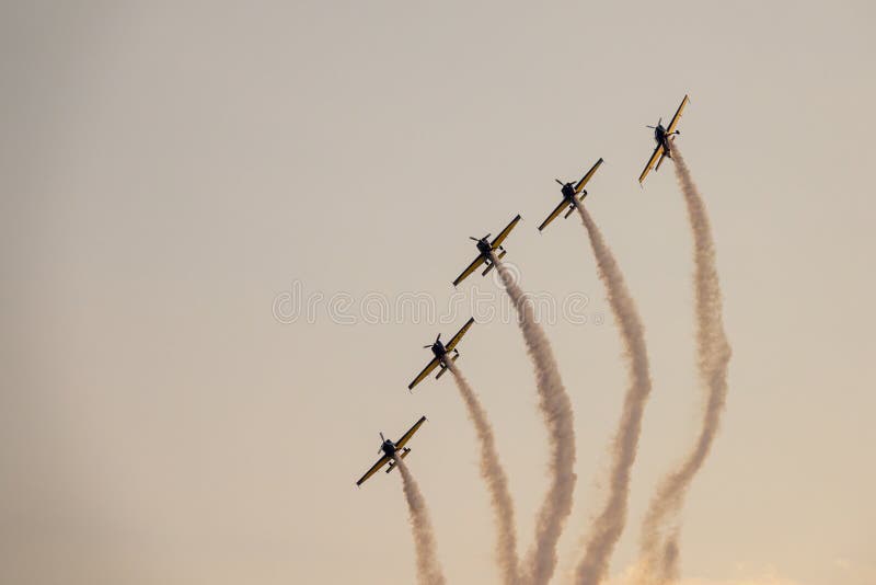 Five Airplanes in Formation on Airshow. Aerobatic Team Performs Flight ...